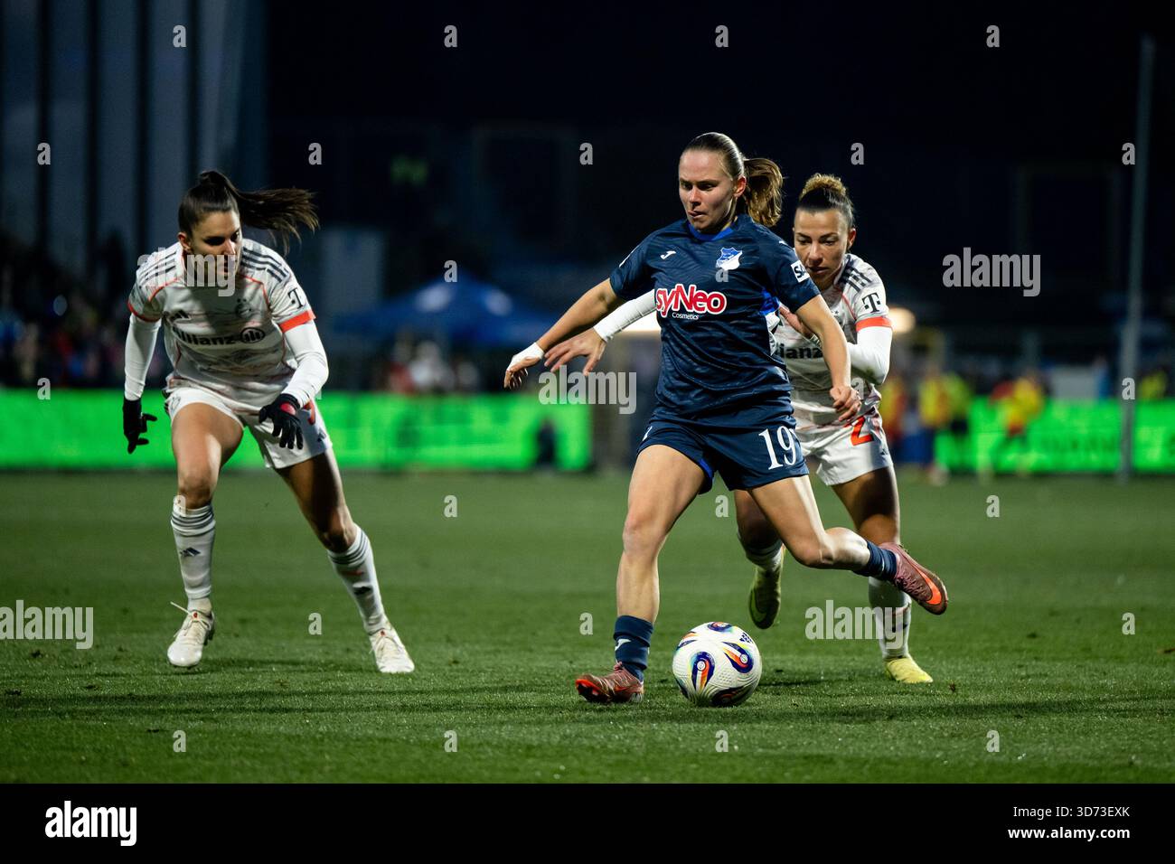 Marie Steiner (Hoffenheim, #19) on the ball in front of Arianna Caruso ...