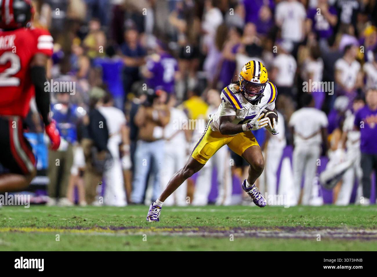 November 22, 2025: LSU's Zavion Thomas (0) tries to break free after ...