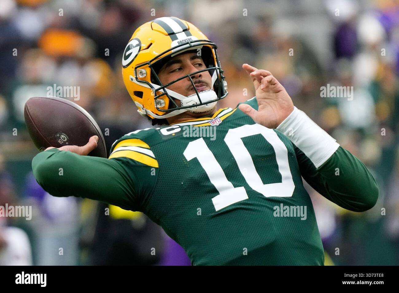 Green Bay Packers quarterback Jordan Love (10) warms up before an NFL football game against the ...