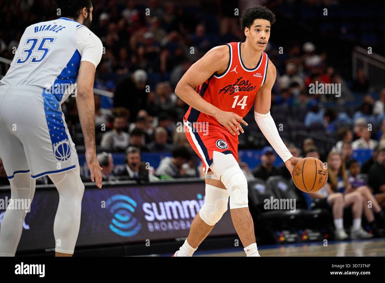 Los Angeles Clippers center Yanic Konan Niederhauser (14) is defended ...