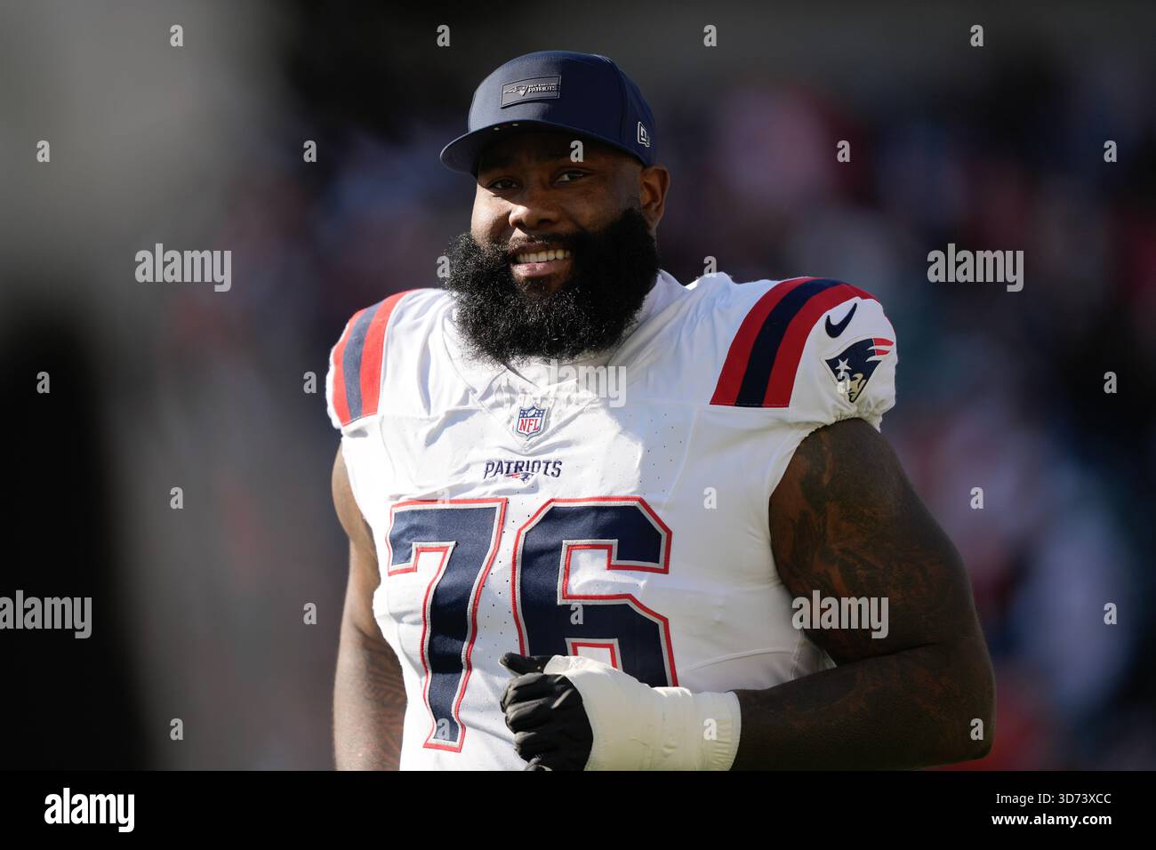 New England Patriots offensive tackle Morgan Moses (76) runs on the ...