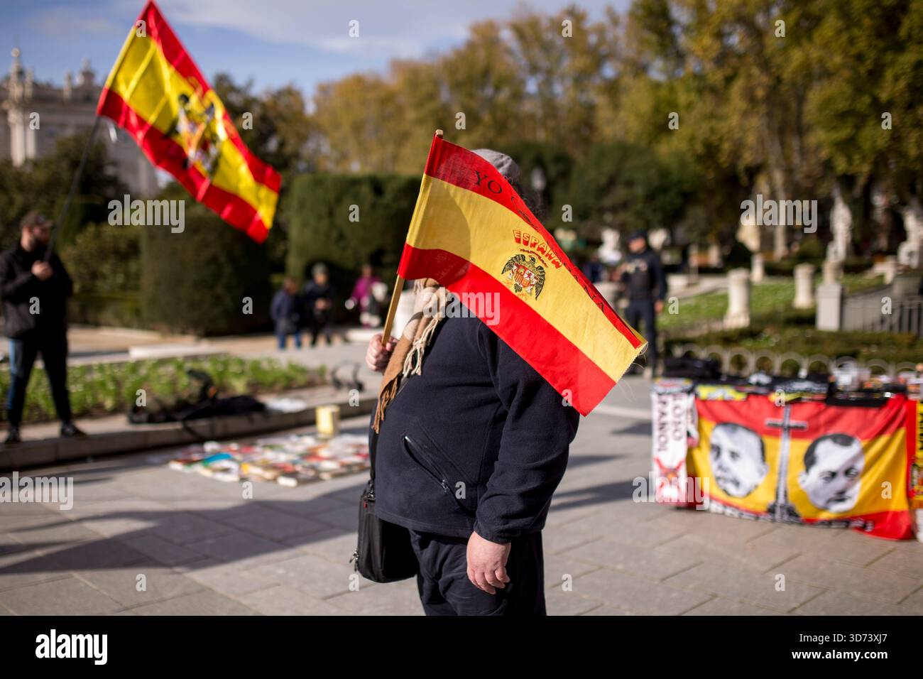 November 23, 2025, Madrid, Madrid, Spain: A far-right supporter holds a ...