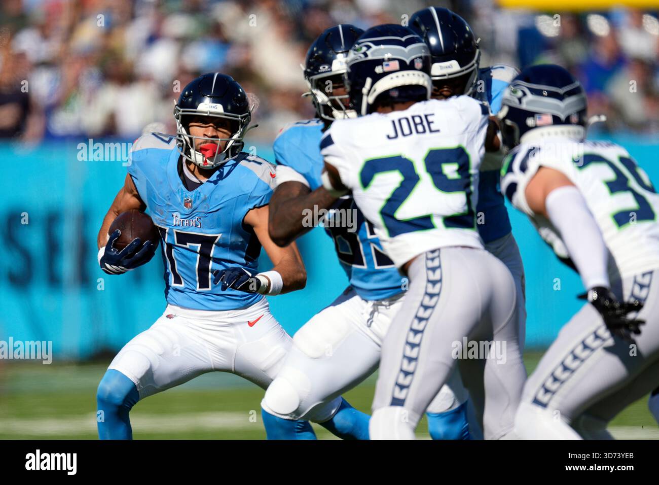 Tennessee Titans wide receiver Chimere Dike (17) carries the ball ...