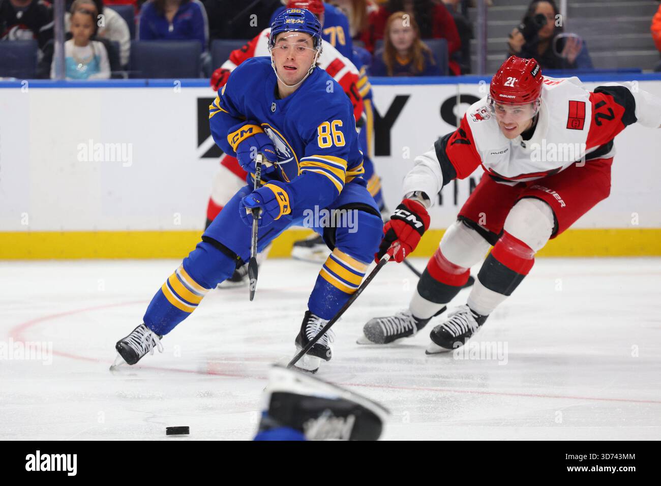 Buffalo Sabres center Noah Ostlund (86) passes the puck past Carolina ...