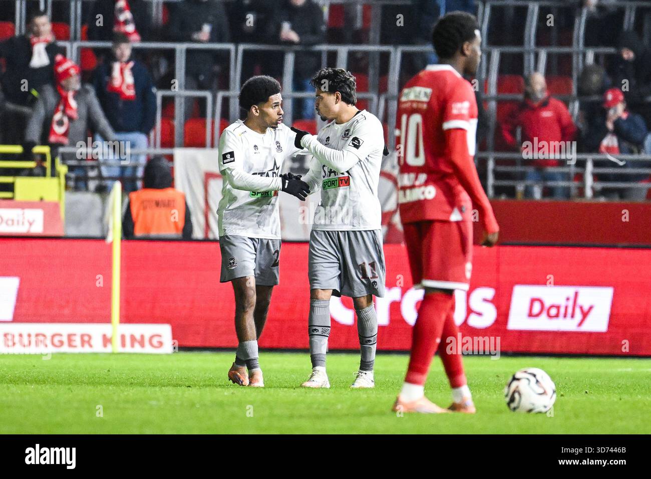 Dender's Ragnar Oratmangoen celebrates after scoring during a soccer ...