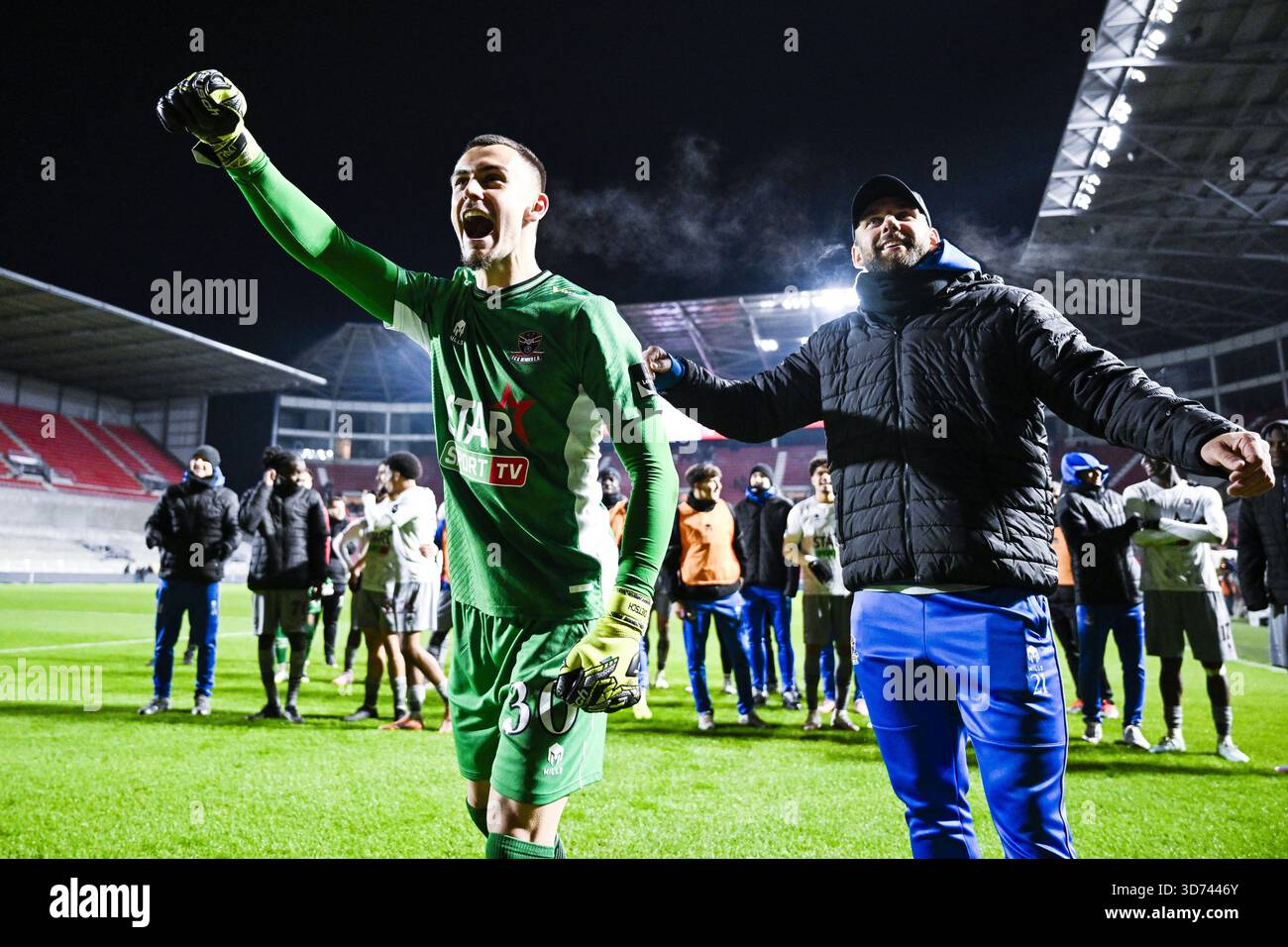 Dender's goalkeeper Guillaume Dietsch and Dender's Kobe Cools celebrate ...