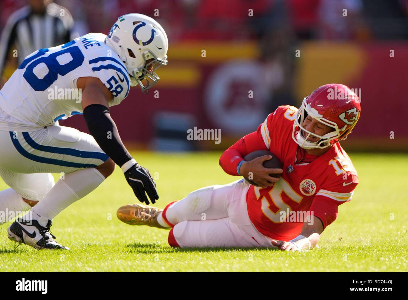 Kansas City Chiefs quarterback Patrick Mahomes (15) slides for a first ...