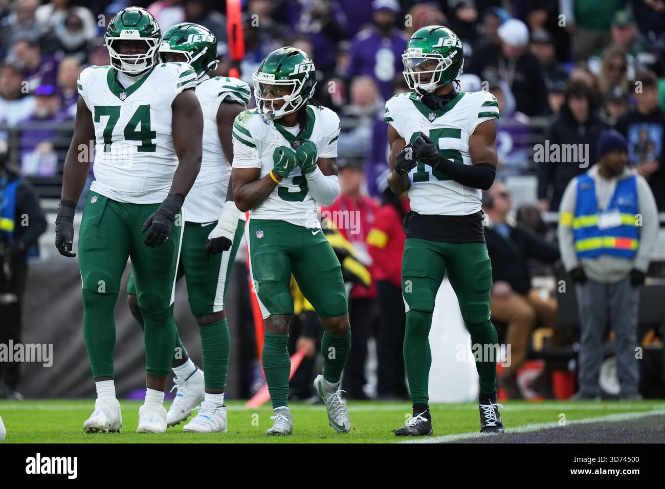 New York Jets wide receiver John Metchie III (3) reacts after scoring a ...
