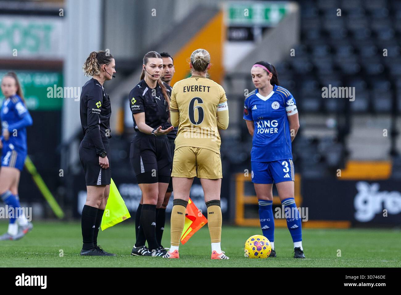 Referee, Alice Parker with assistants & team captains at the coin toss ...