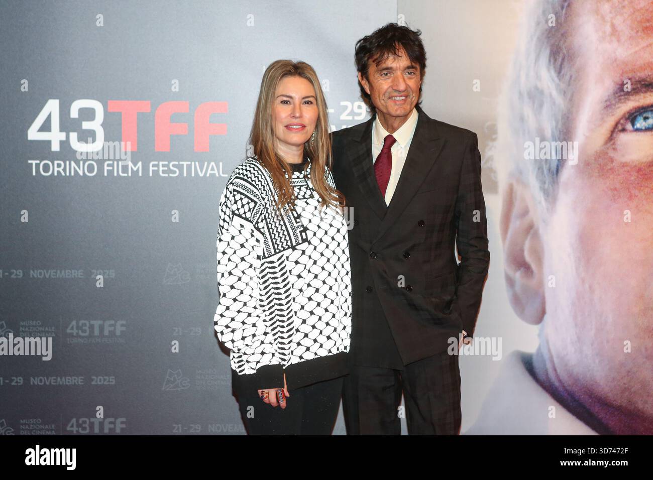 Farah Nabulsi (L) and Giulio Base (R) attend the red carpet on Day 3 of ...