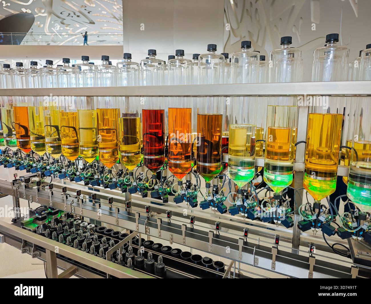 Perfume production. Different scents in bottles. Robotic perfume ...