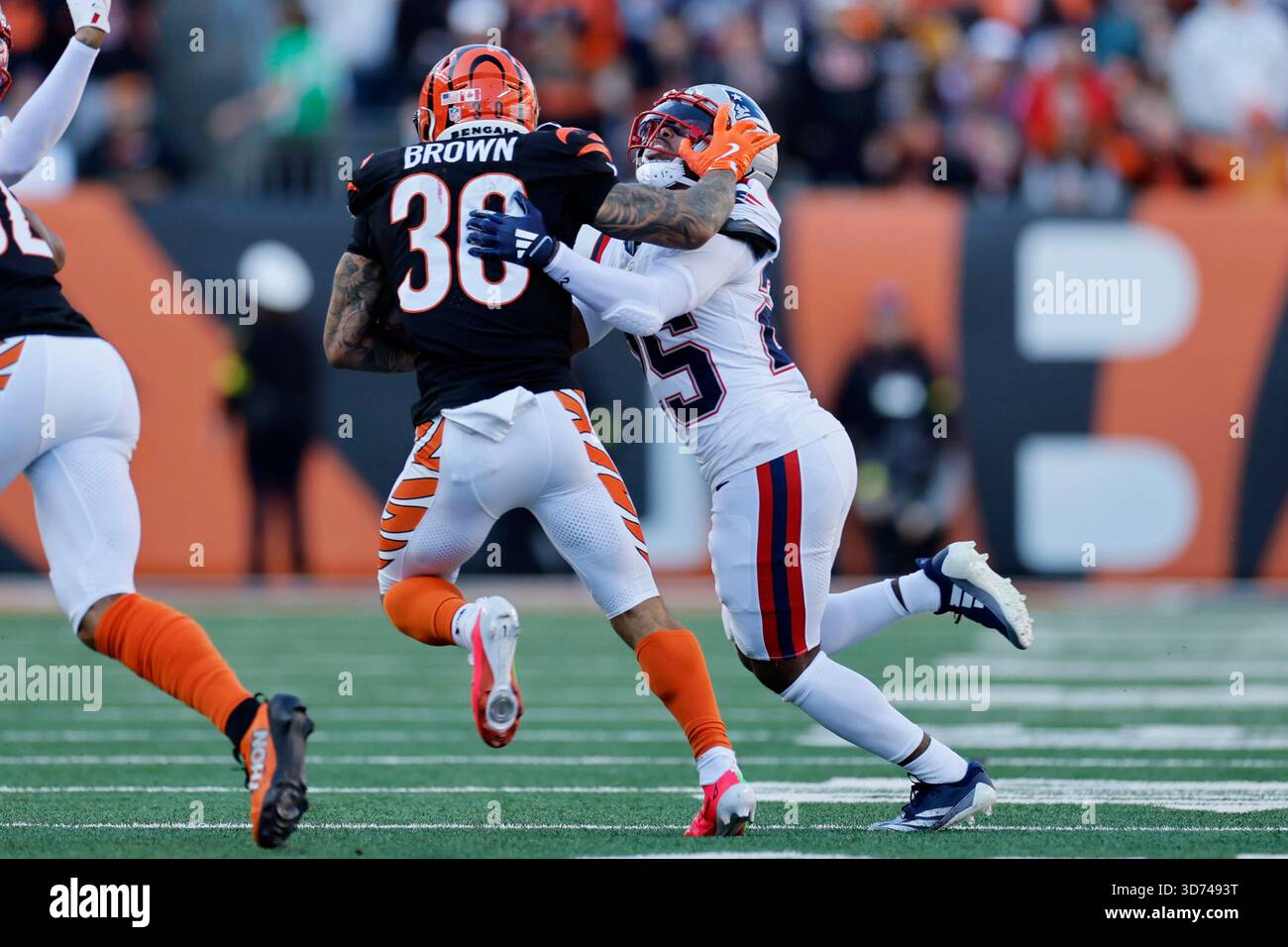 Cincinnati Bengals running back Chase Brown (30) is tackled by New ...