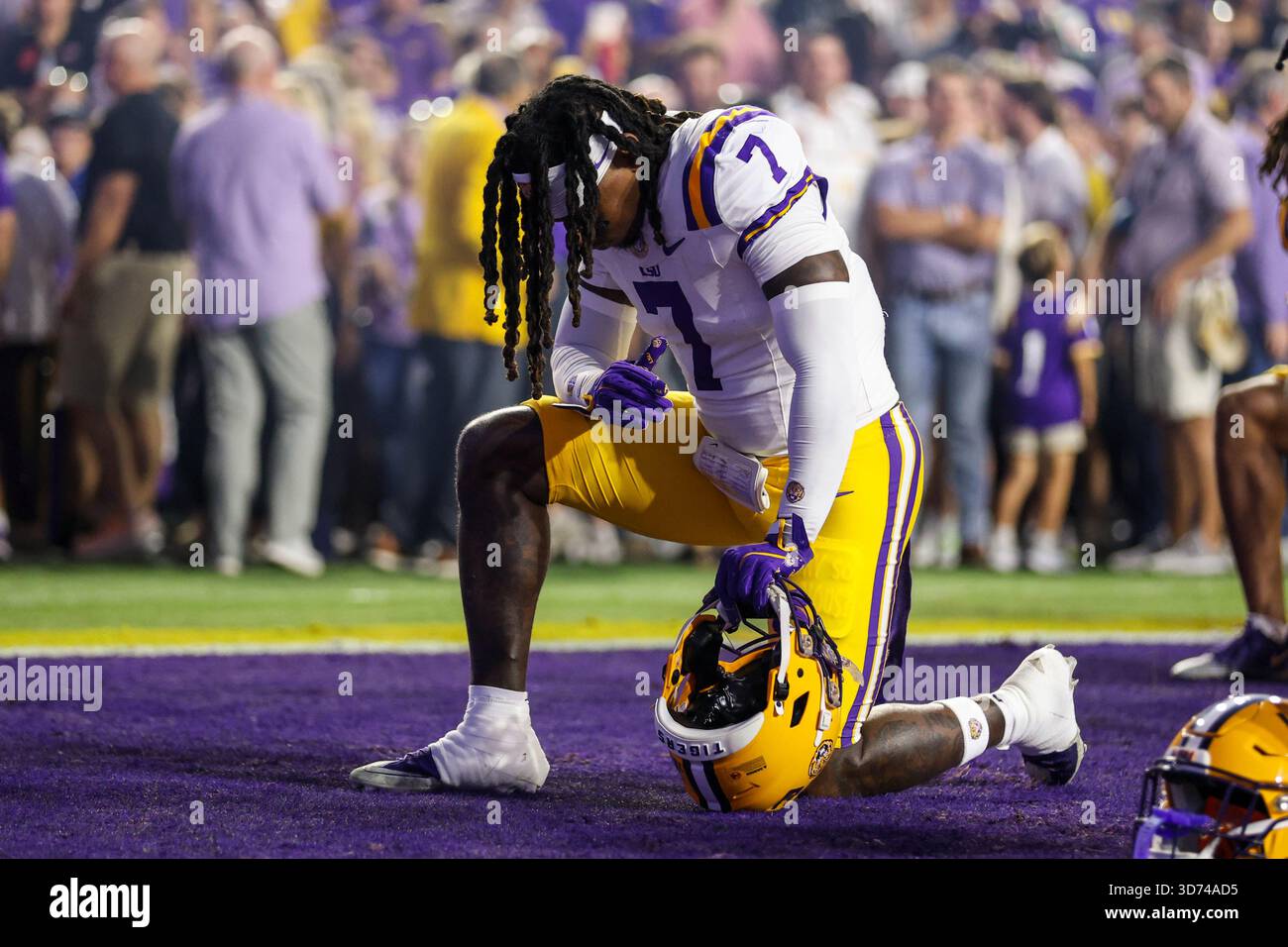 November 22, 2025: LSU linebacker Harold Perkins (7) prays in the ...