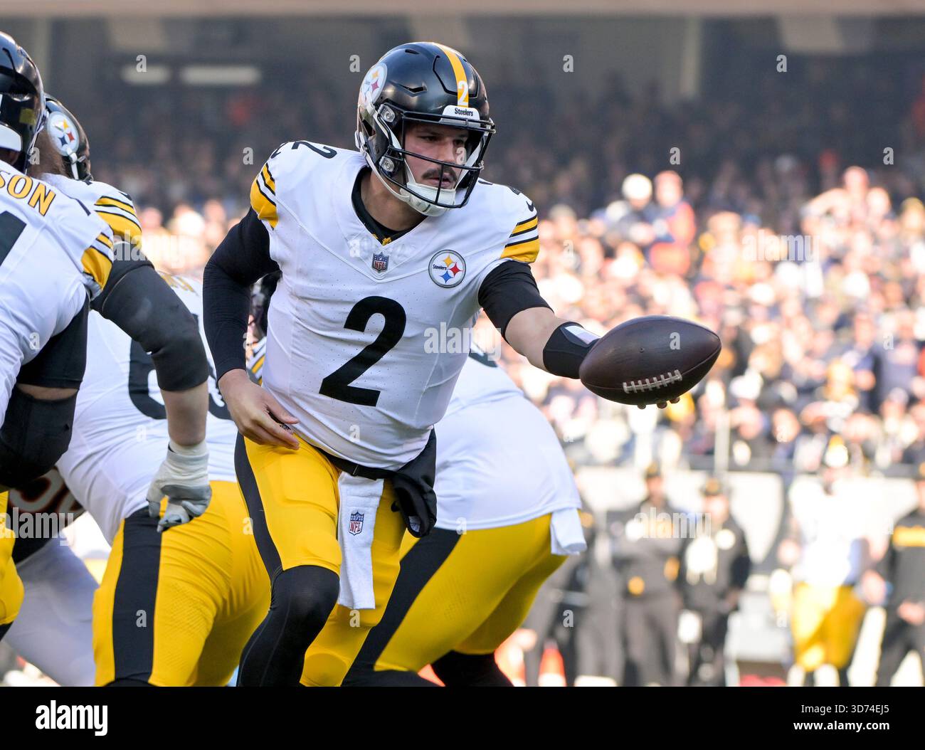 Pittsburgh Steelers quarterback Mason Rudolph (2) hands off the ball ...