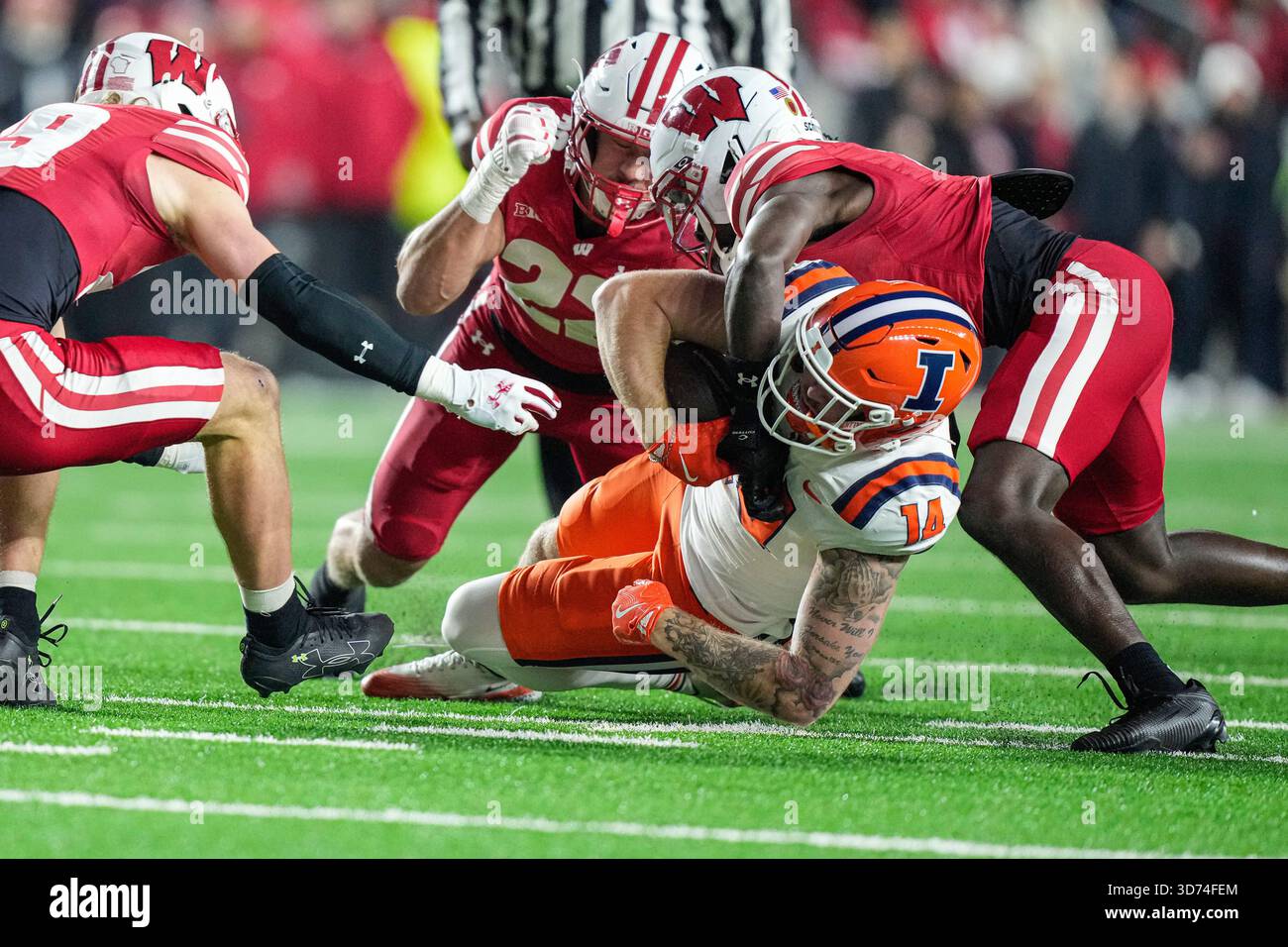 Illinois tight end Cole Rusk (14) against Wisconsin during the first ...