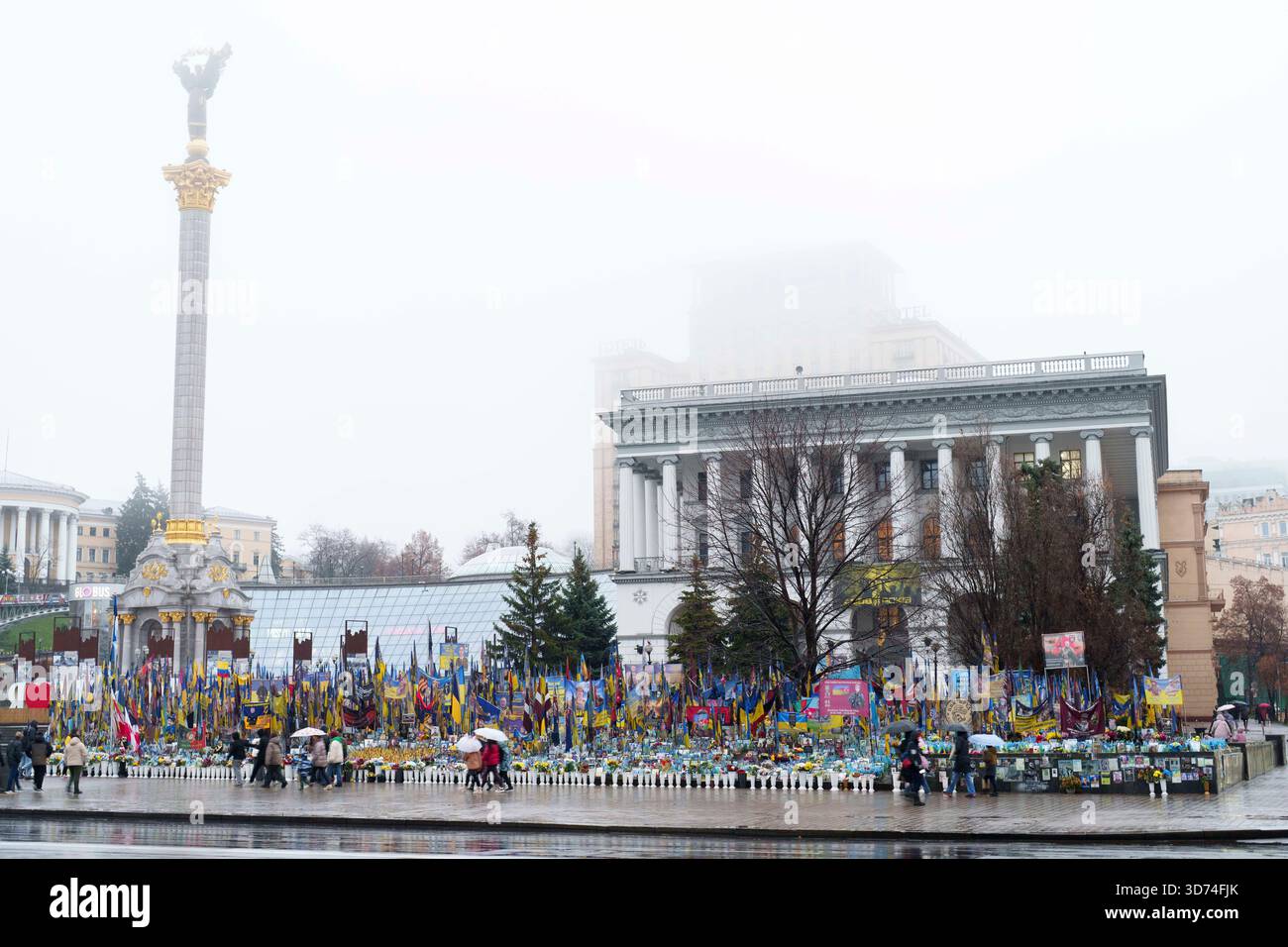 People walk on Independence Square Maidan Nezalezhnosti in central Kyiv ...