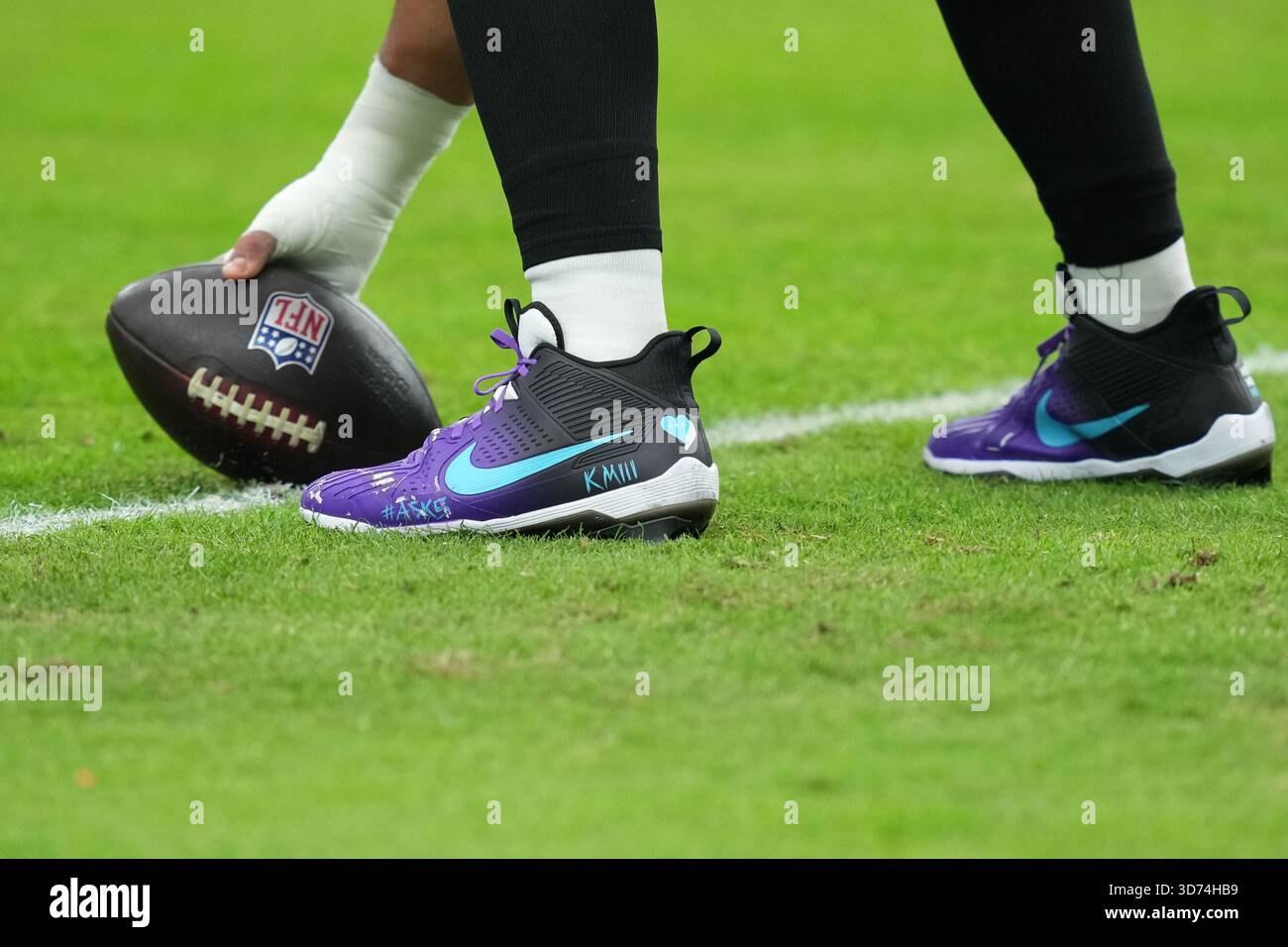 Las Vegas Raiders guard Caleb Rogers (76) wears cleats for My Cause My Cleats before an NFL ...