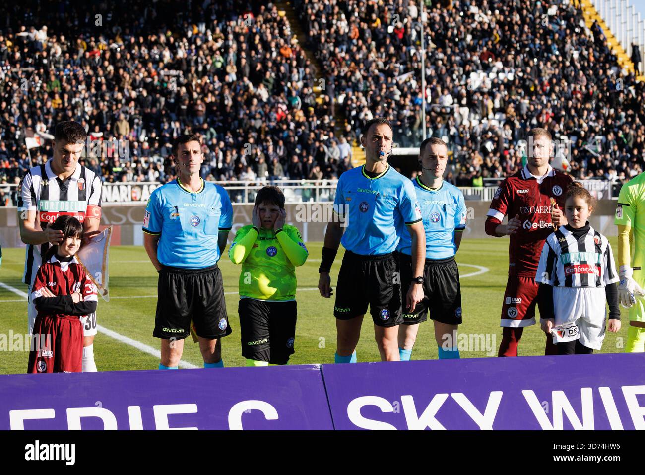 Ascoli captain Marcos Curado, referee assistant Mario Chichi, referee ...