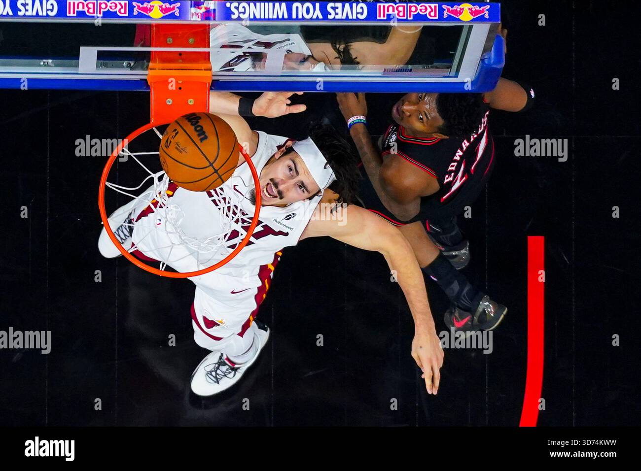 Miami Heat's Jaime Jaquez Jr., left, shoots the ball against ...
