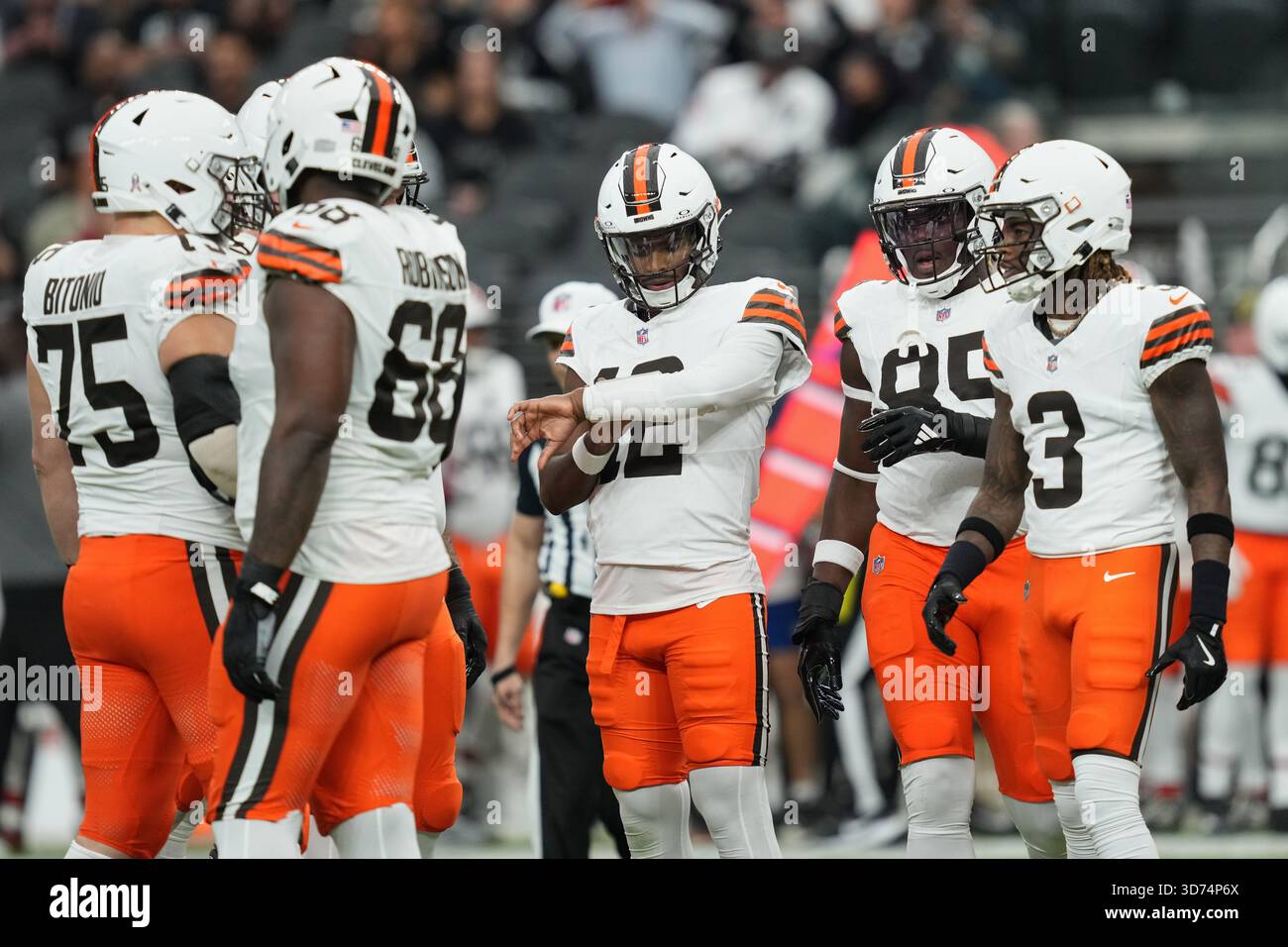 Cleveland Browns quarterback Shedeur Sanders (12) prepares for a huddle ...