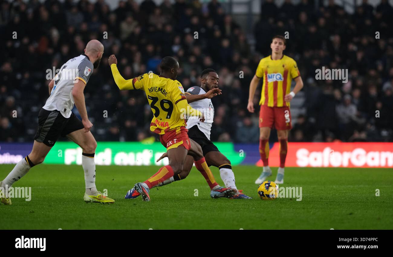 Edo Kayembe of Watford FC and Ebou Adams of Derby County seen during ...