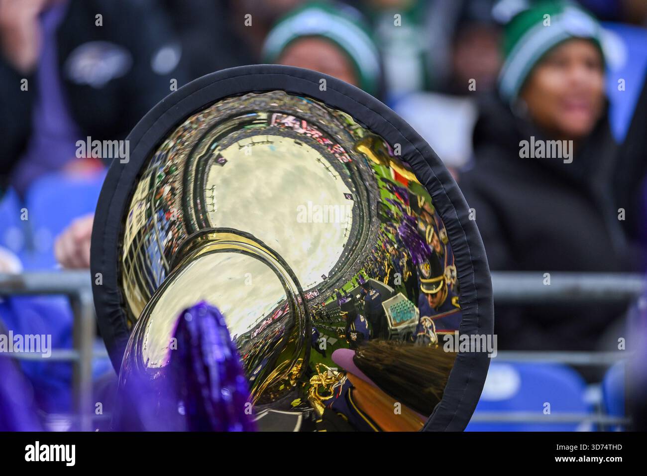 The field is reflected in a Baltimore Ravens marching band tuba during ...