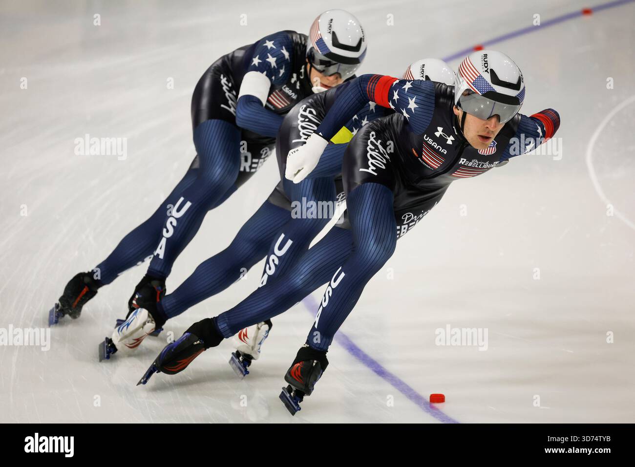 Casey Dawson, right to left, of the United States, leads teammates ...