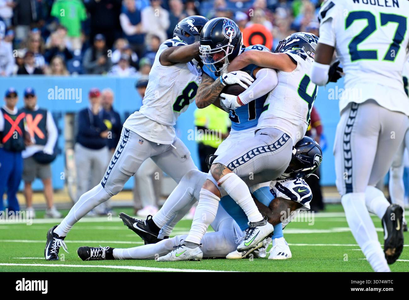 Tennessee Titans wide receiver Xavier Restrepo (87) is stopped by ...
