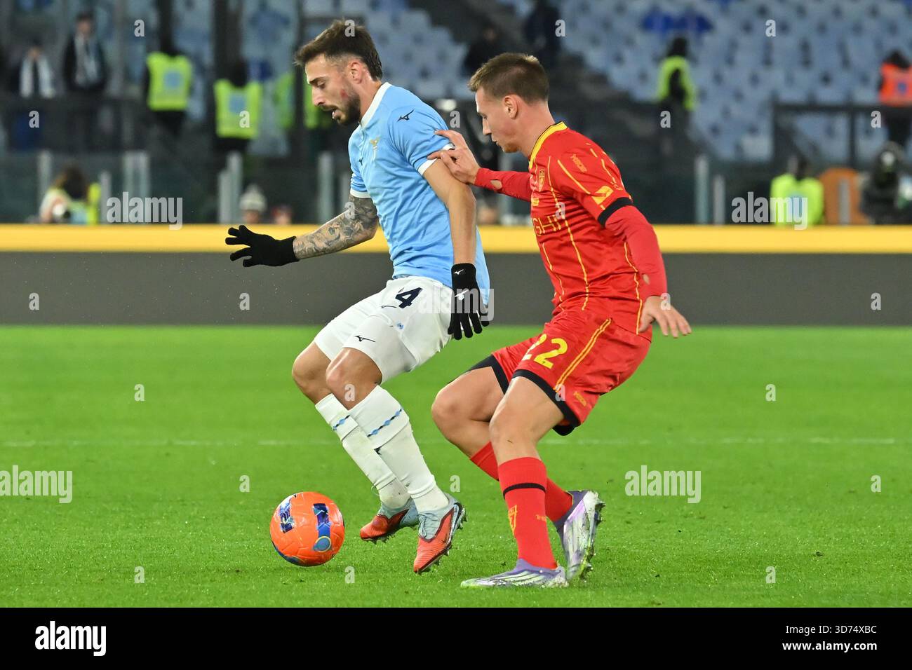 Mario Gila of SS Lazio,Francesco Camarda of Lecce during the serie A ...