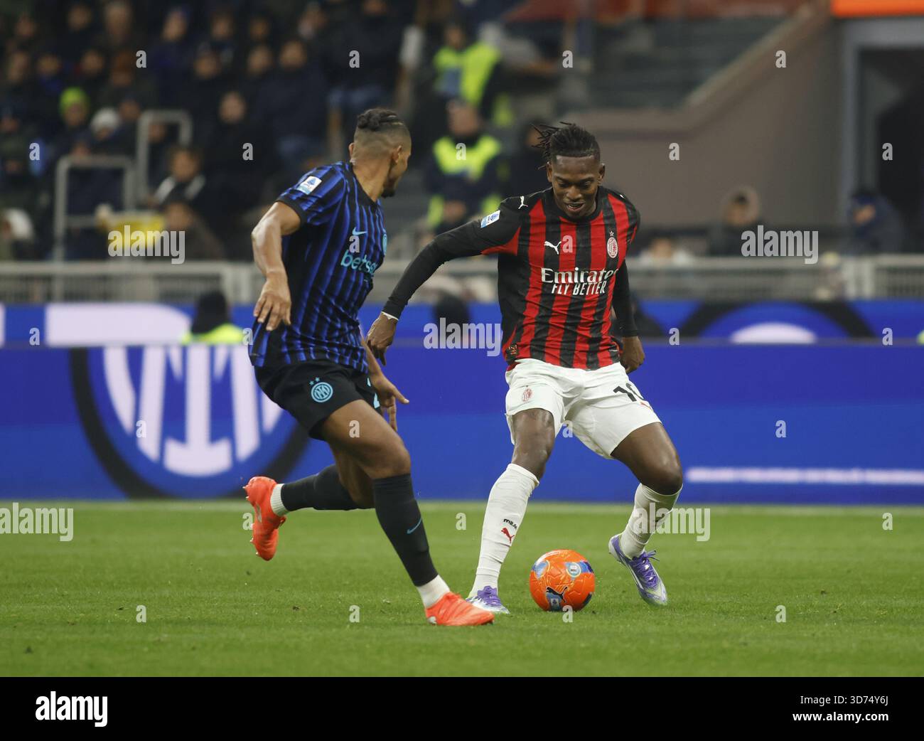 Rafel Leao of AC Milan and Manuel Akanji of FC Inter during the Italian ...