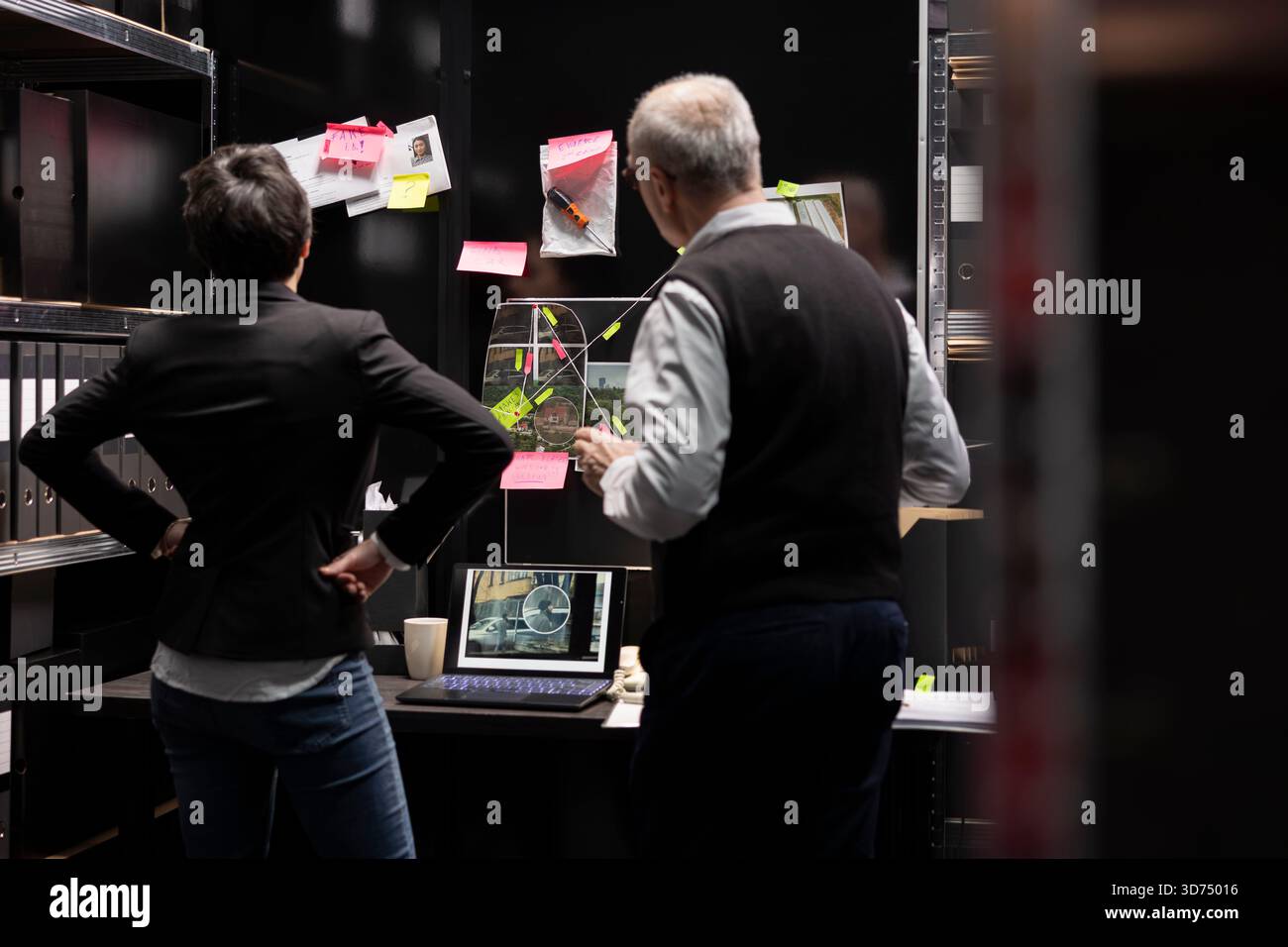 Team of two private detectives investigating an organized crime case ...