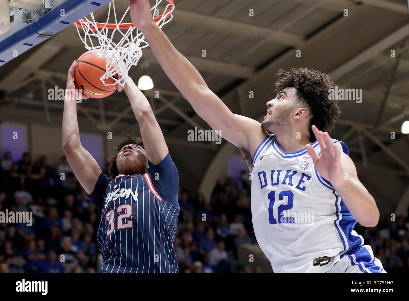 Howard forward Travelle Bryson (32) works against Duke forward Cameron Boozer (12) during the ...