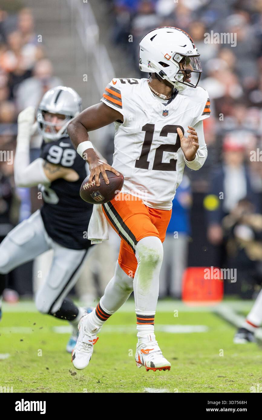 Cleveland Browns quarterback Shedeur Sanders (12) rolls out against the ...