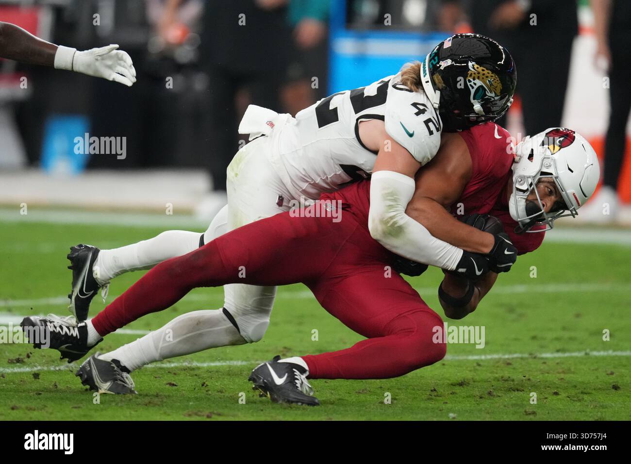 Jacksonville Jaguars safety Andrew Wingard (42) tackles Arizona ...