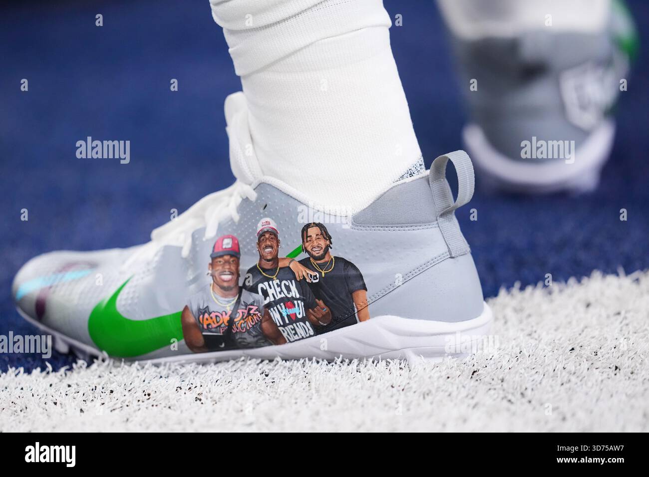 The cleats of Philadelphia Eagles linebacker Jalyx Hunt (58) are shown ...