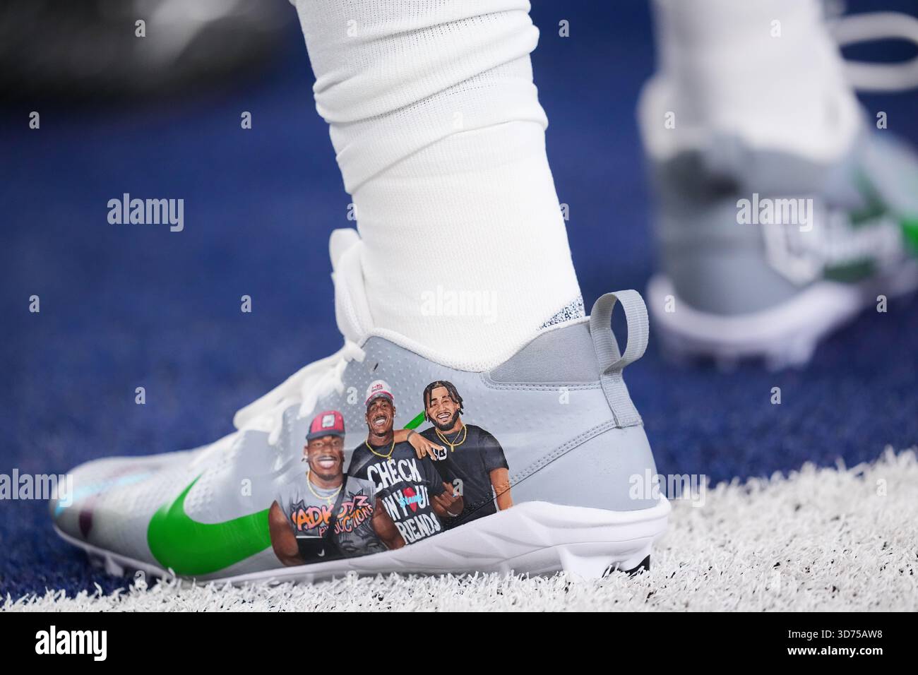 The cleats of Philadelphia Eagles linebacker Jalyx Hunt (58) are shown ...