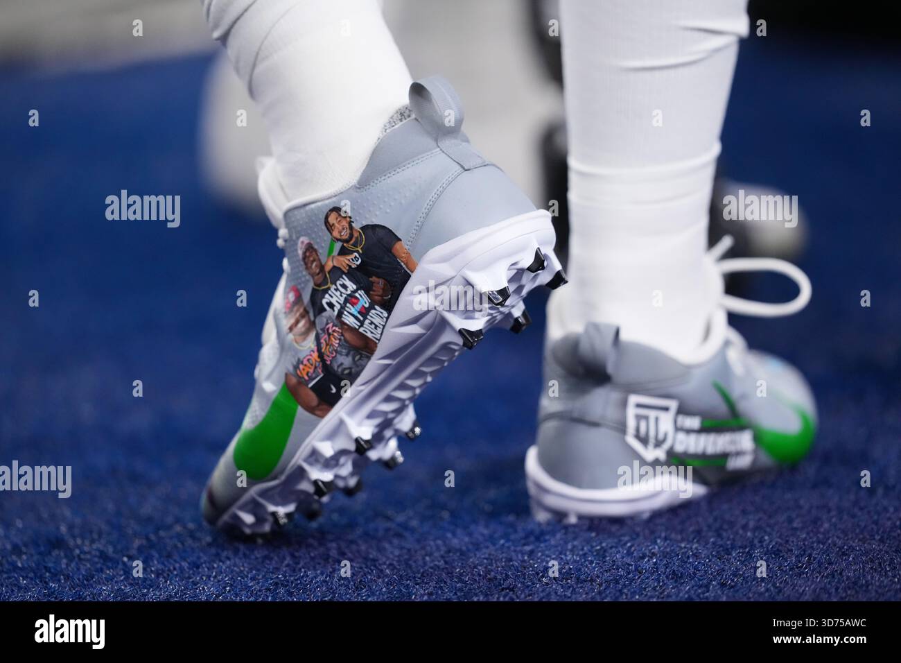 The cleats of Philadelphia Eagles linebacker Jalyx Hunt (58) are shown ...