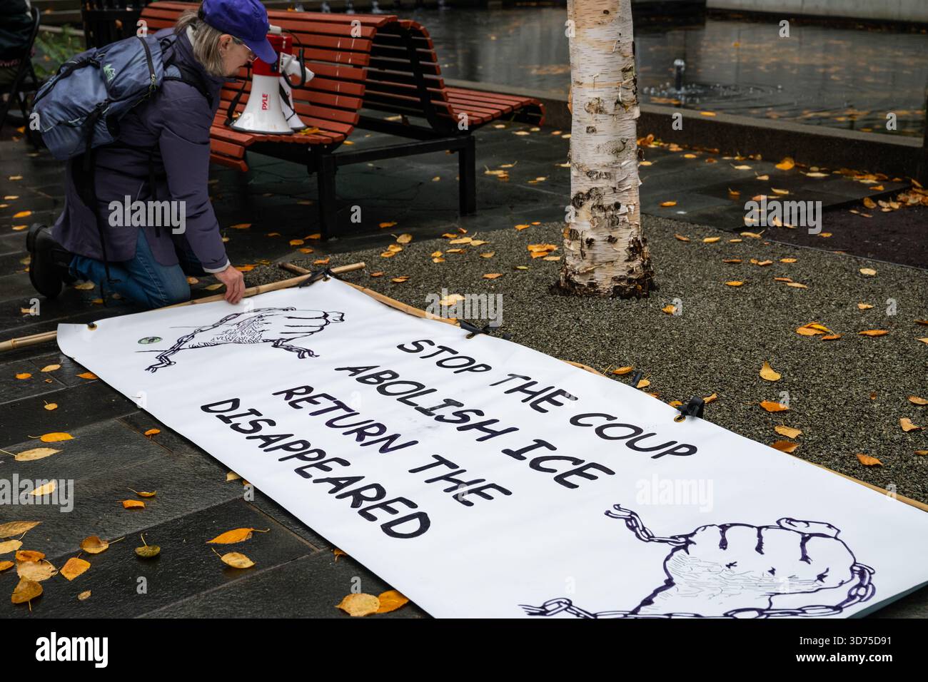 Seattle, USA. 23rd Nov, 2025. People gathering at the Stand Up To Trump ...