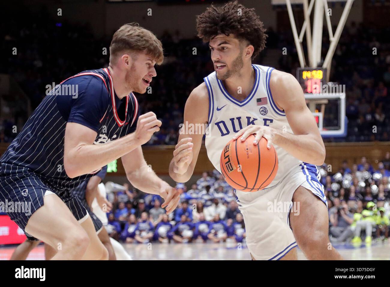 Duke forward Cameron Boozer, right, drives against Howard center Danas ...