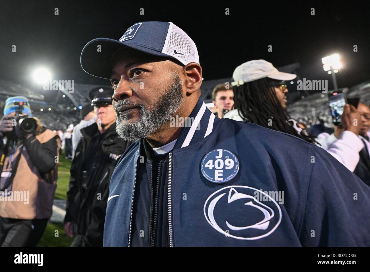 Penn State interim head coach Terry Smith leaves the field following a ...