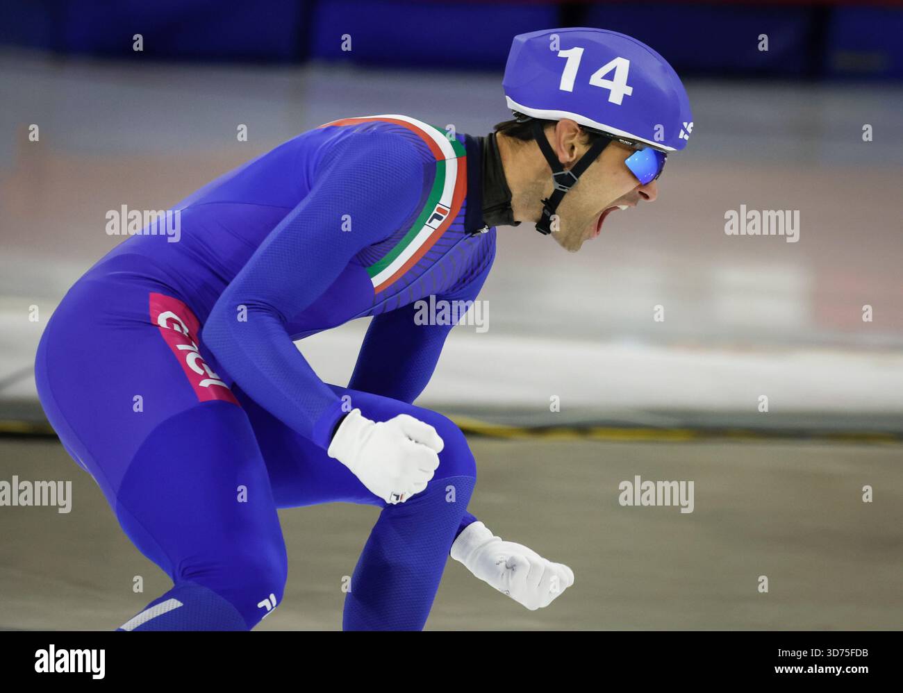 Italy's Andrea Giovannini, right, celebrates winning the men's mass ...