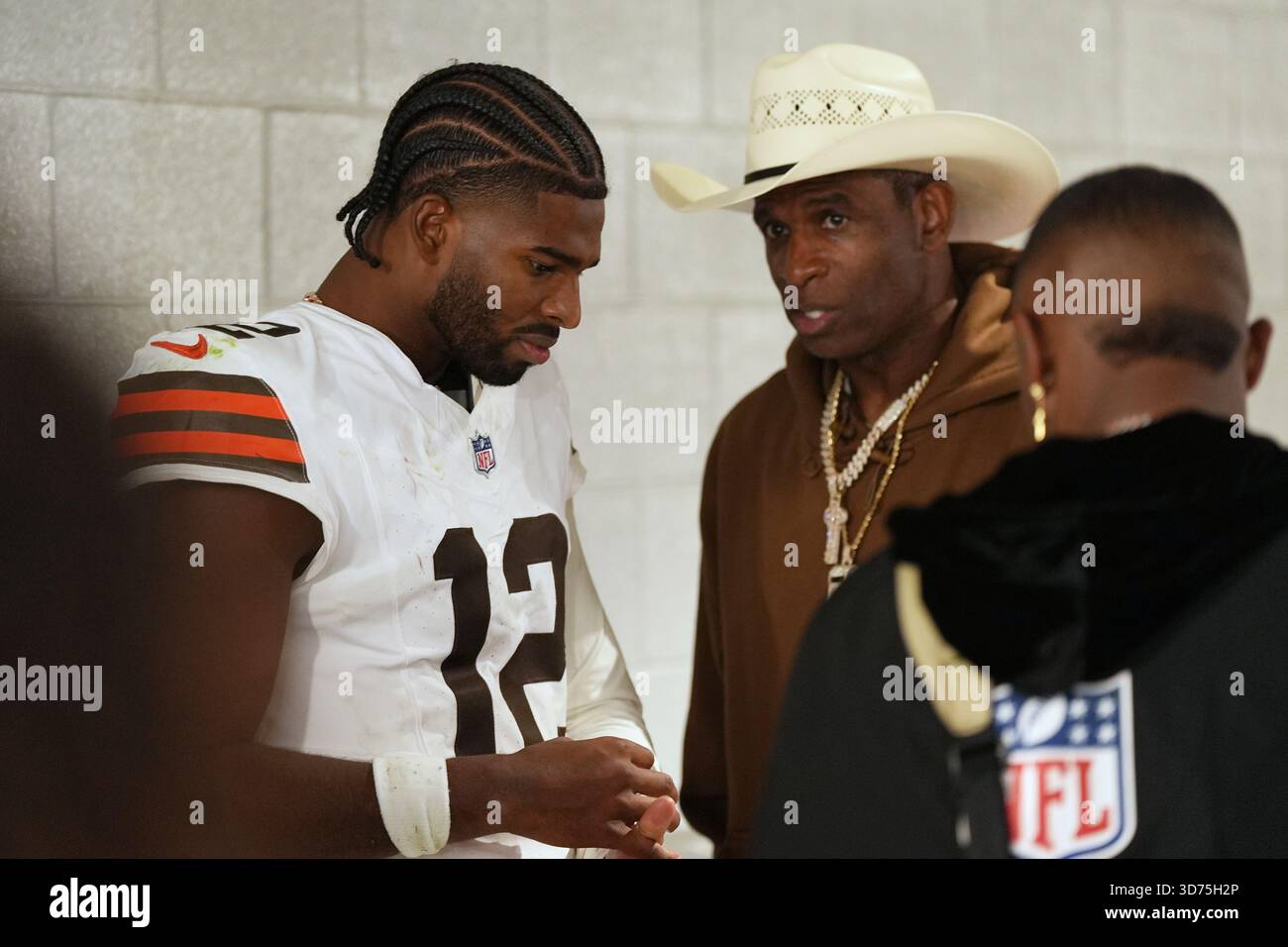 Cleveland Browns quarterback Shedeur Sanders (12) speaks with his ...