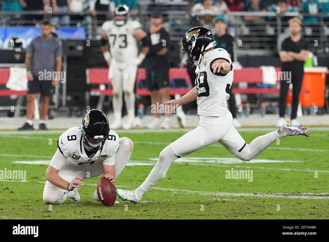 Jacksonville Jaguars place kicker Cam Little (39) kicks a field goal ...