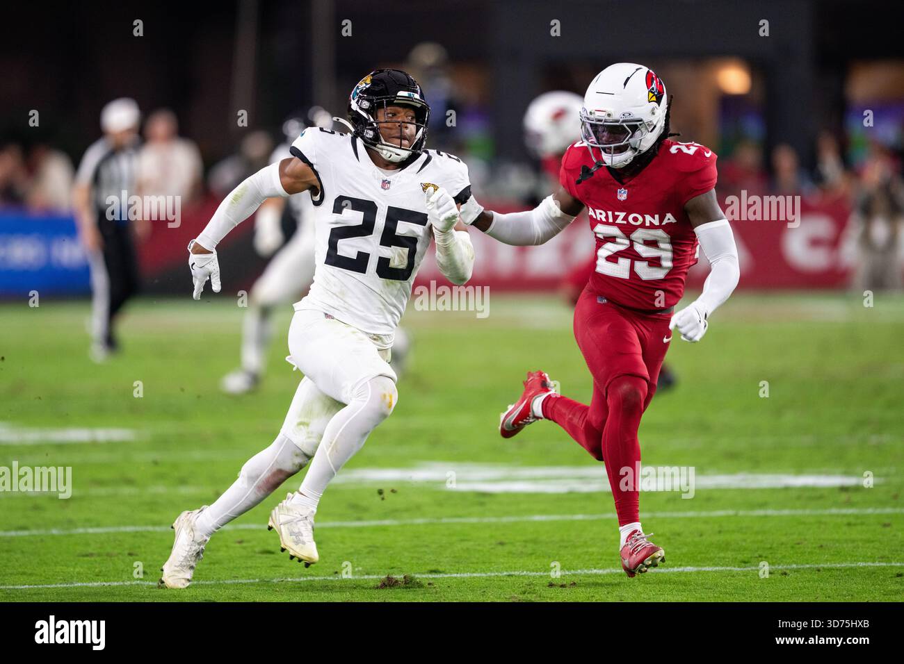 Jacksonville Jaguars safety Rayuan Lane III (25) runs alongside Arizona ...