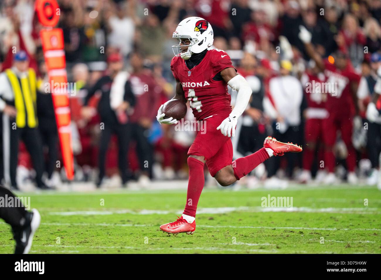 Arizona Cardinals wide receiver Greg Dortch (4) runs for a touchdown ...