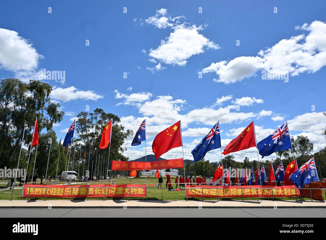 Chinese and Australian flags are seen ahead of the visit by Zhao Leji ...