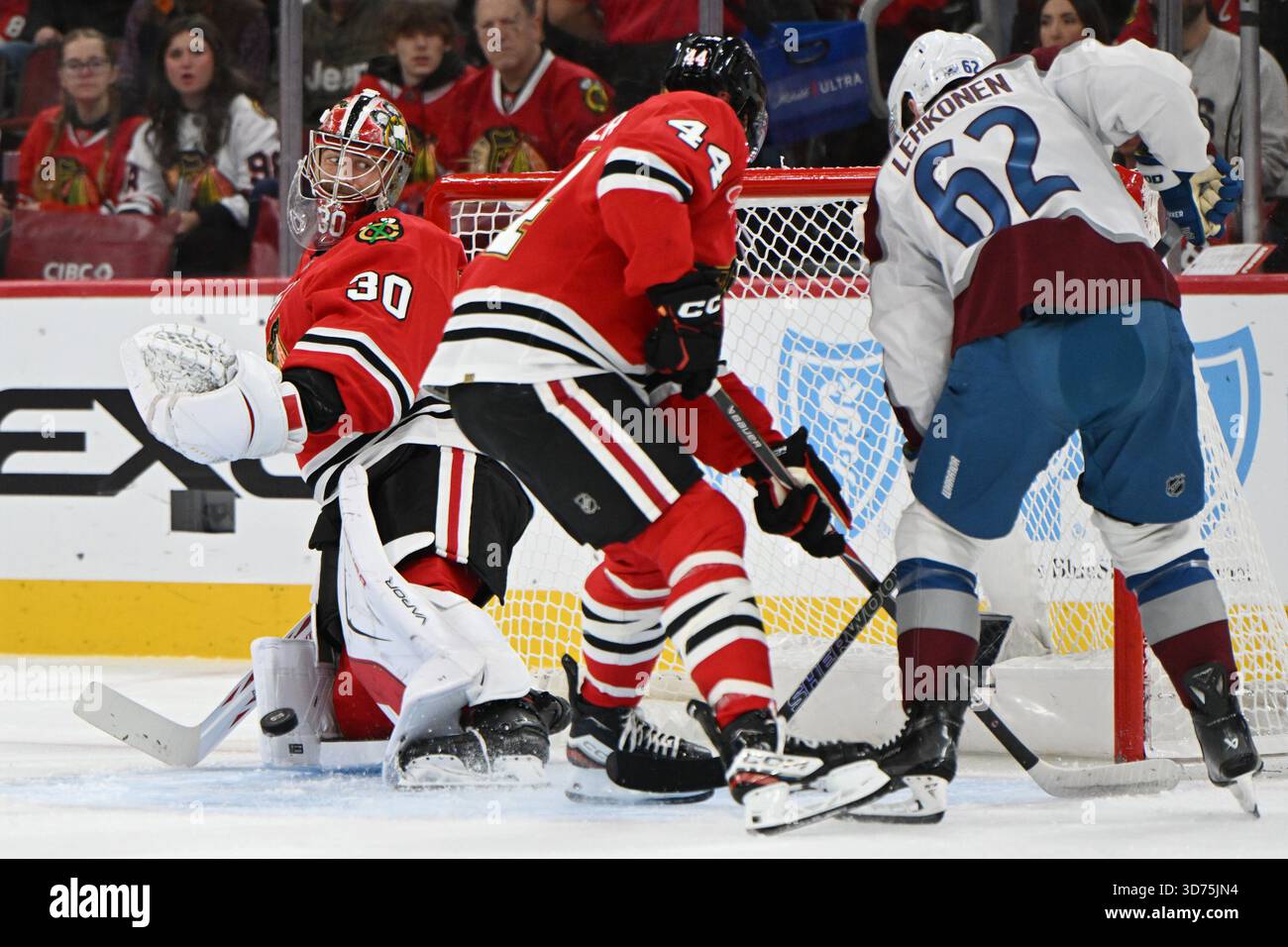 Chicago Blackhawks goalie Spencer Knight (30) makes a save during the ...