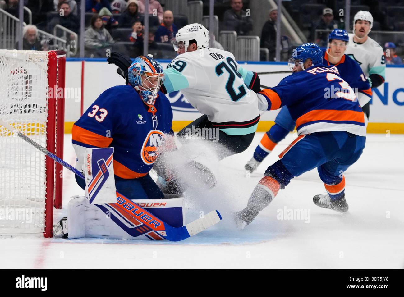New York Islanders goaltender David Rittich (33) stops a shot by ...