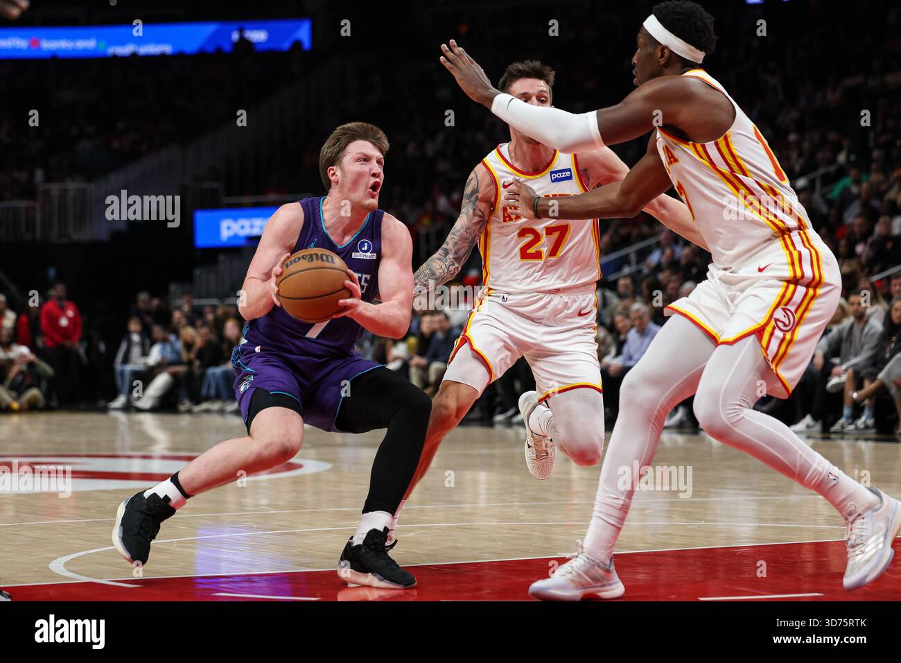 Charlotte Hornets guard Kon Knueppel (7) drives to the basket during ...