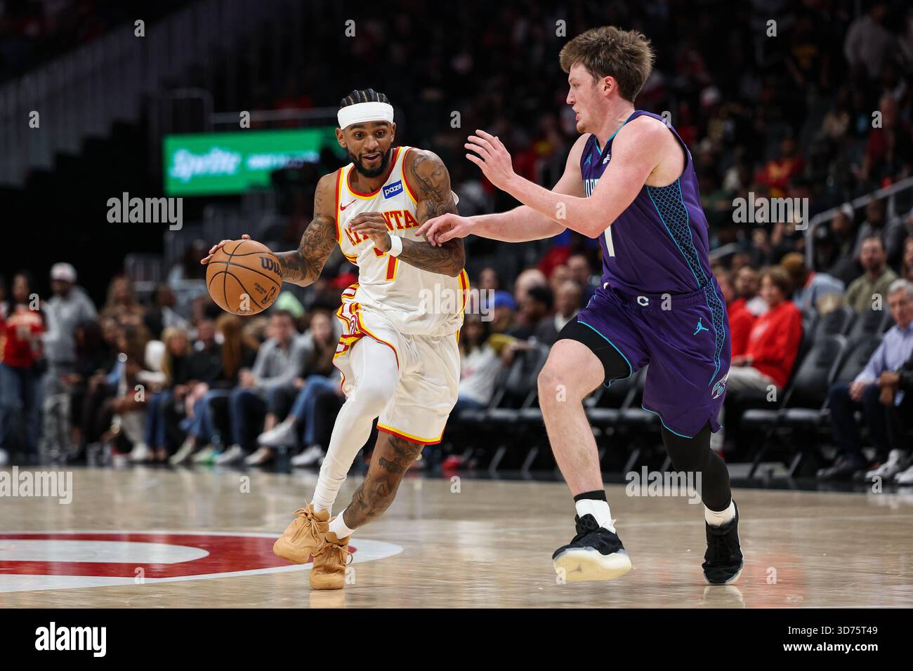 Atlanta Hawks guard Nickeil Alexander-Walker (7) drives to the basket ...